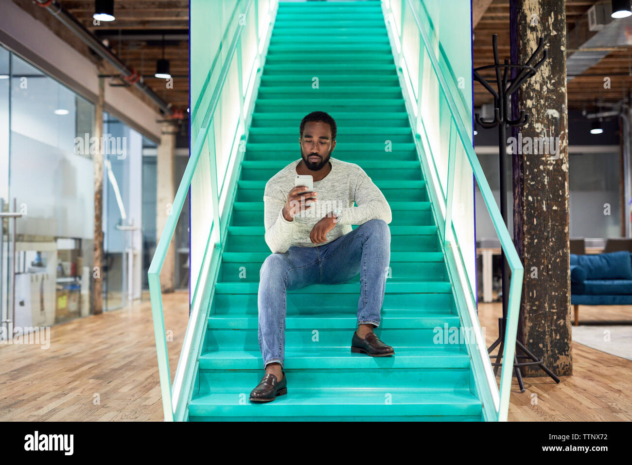 Businessman sitting using mobile hi-res stock photography and images ...