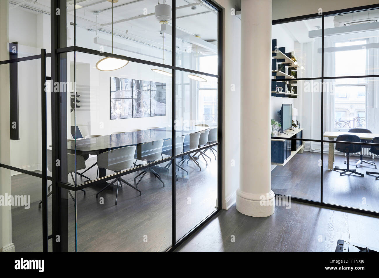 Conference room seen through window in modern office Stock Photo - Alamy
