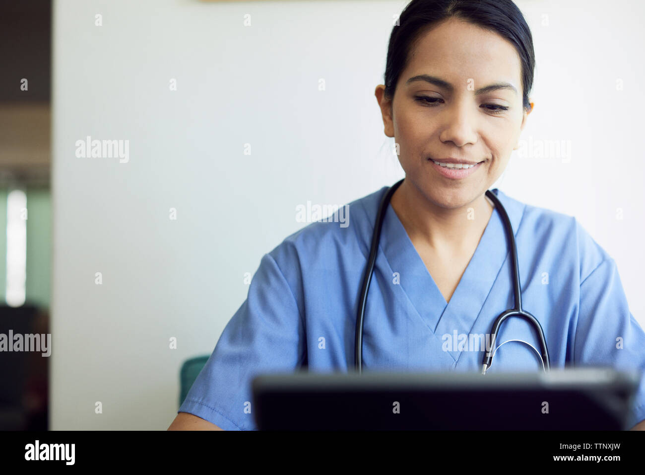 Communication smiling sitting uniform hi-res stock photography and ...