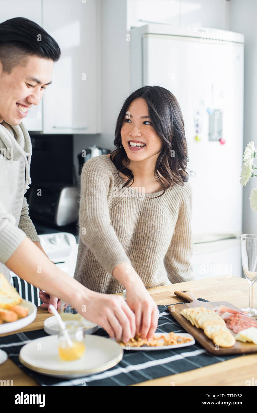 Indian couple dining table hi-res stock photography and images - Alamy