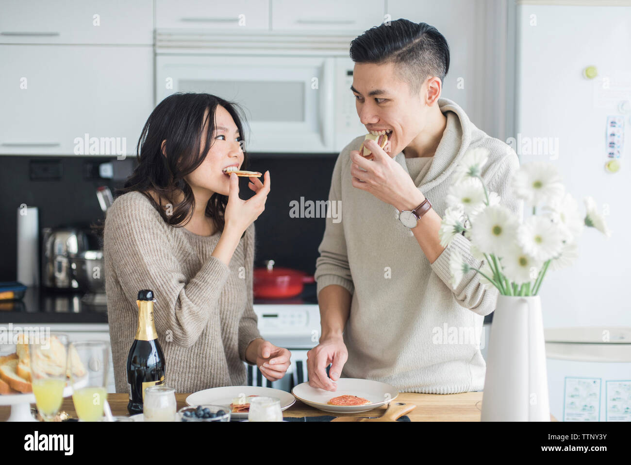Indian man eating breakfast hi-res stock photography and images - Alamy