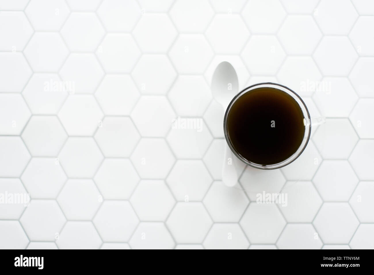 Minimal Coffee on White Tile Stock Photo - Alamy