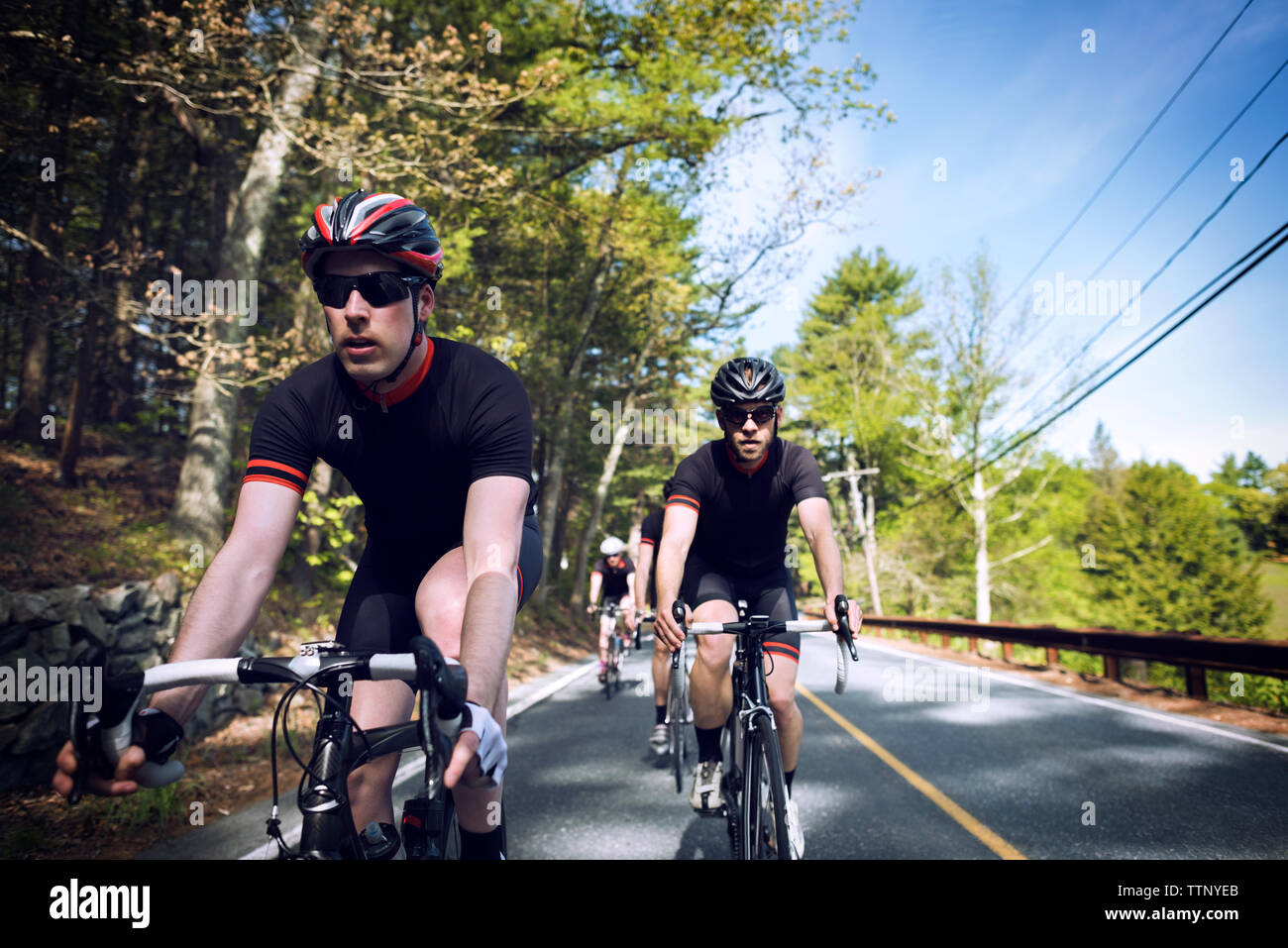 Cyclists with helmets hi-res stock photography and images - Alamy