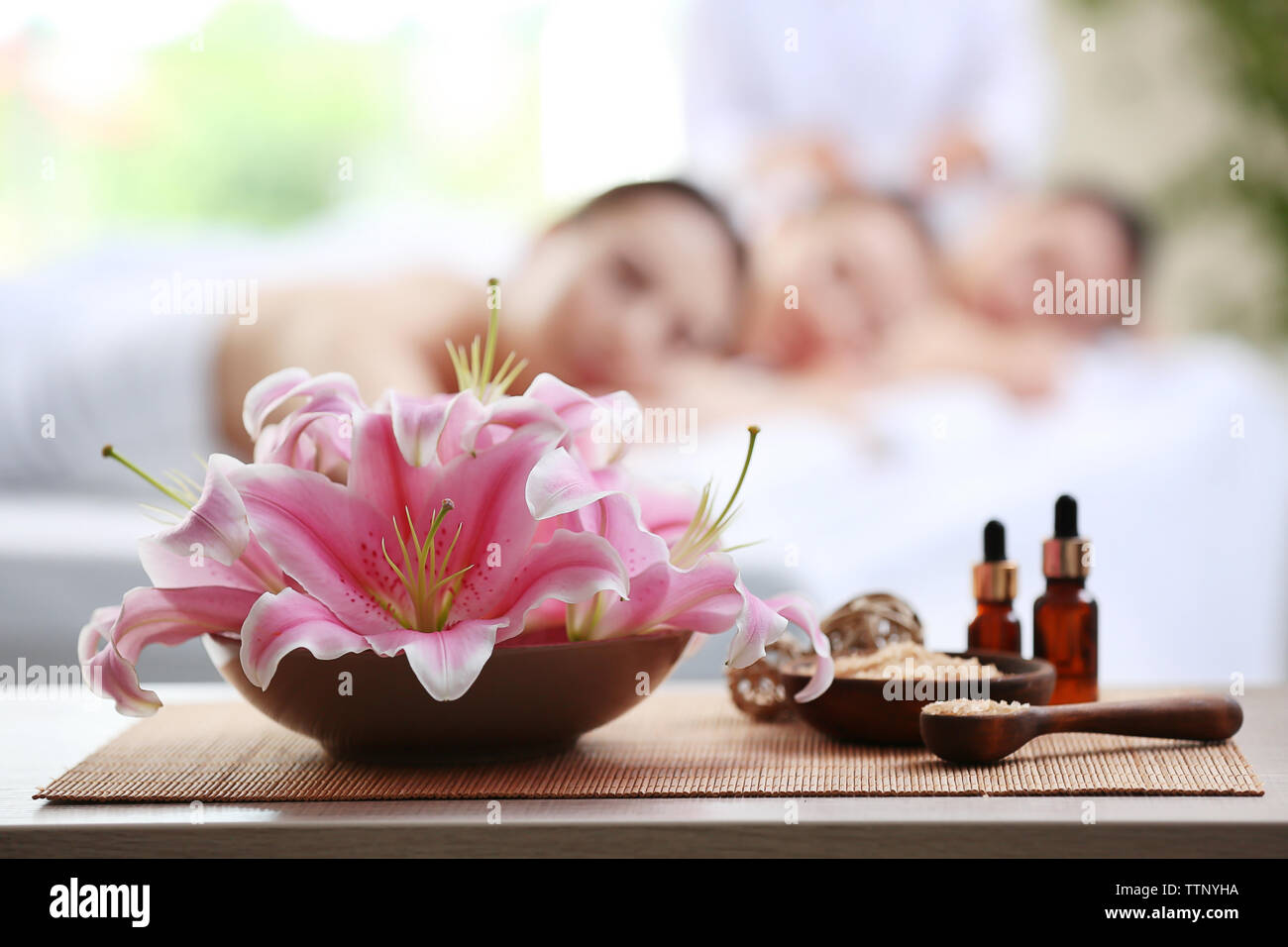 Spa composition and girls on blurred background Stock Photo - Alamy