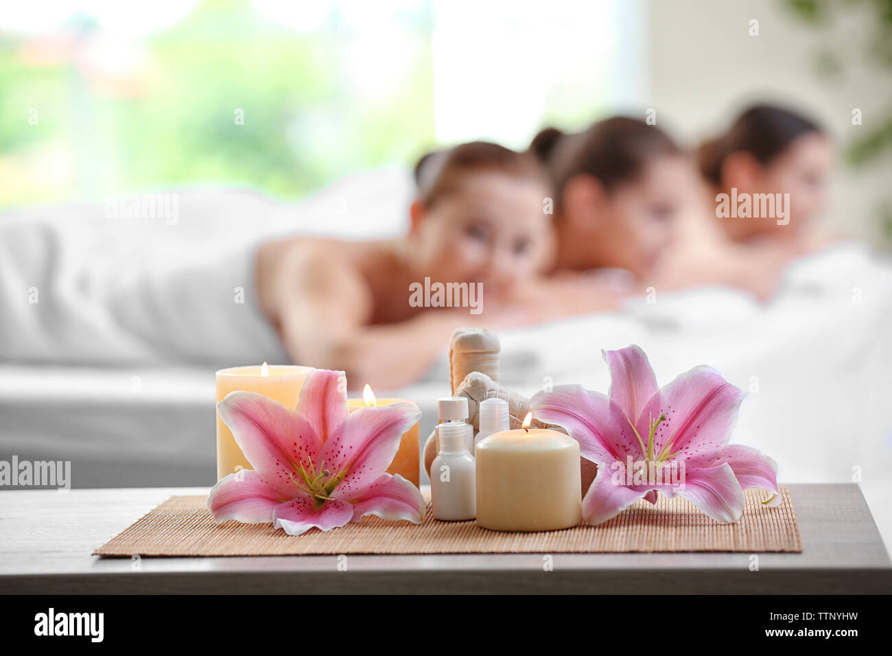 Spa composition and girls on blurred background Stock Photo - Alamy