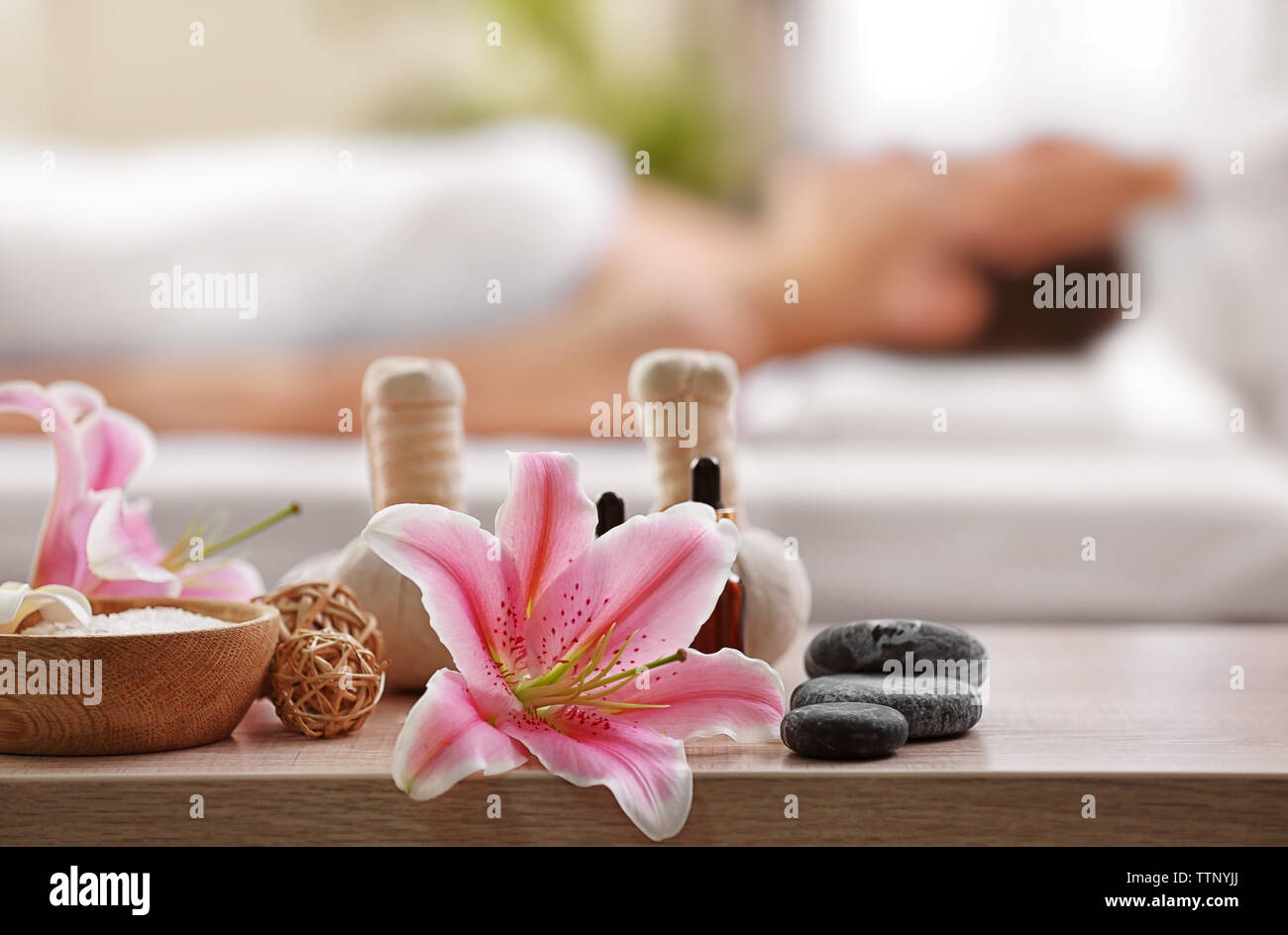 Spa composition and girls on blurred background Stock Photo - Alamy