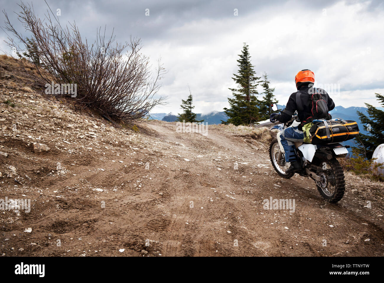 Rear view riding motorcycle hi-res stock photography and images - Alamy