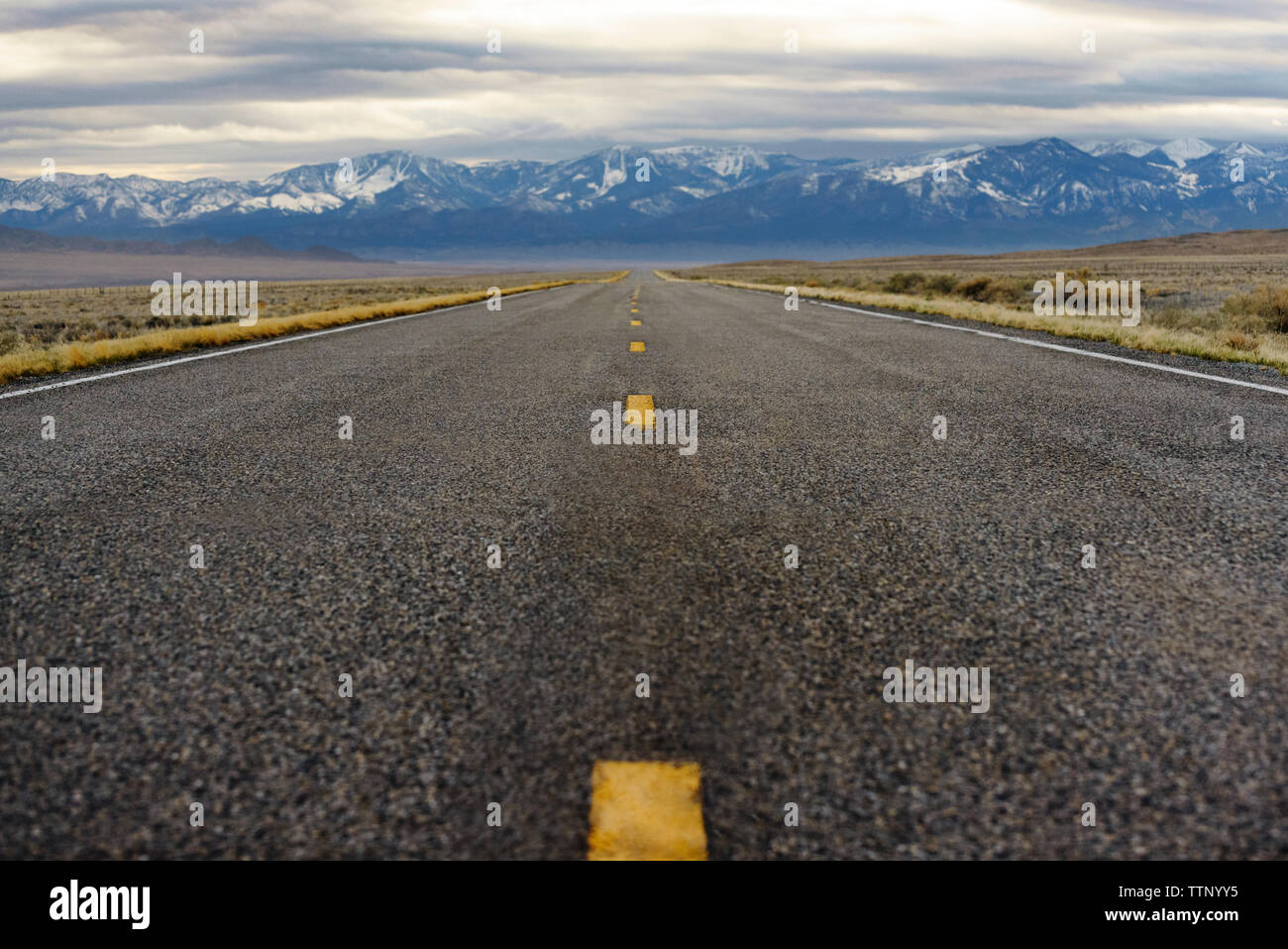 Low angle of Highway leading towards mountain Stock Photo - Alamy