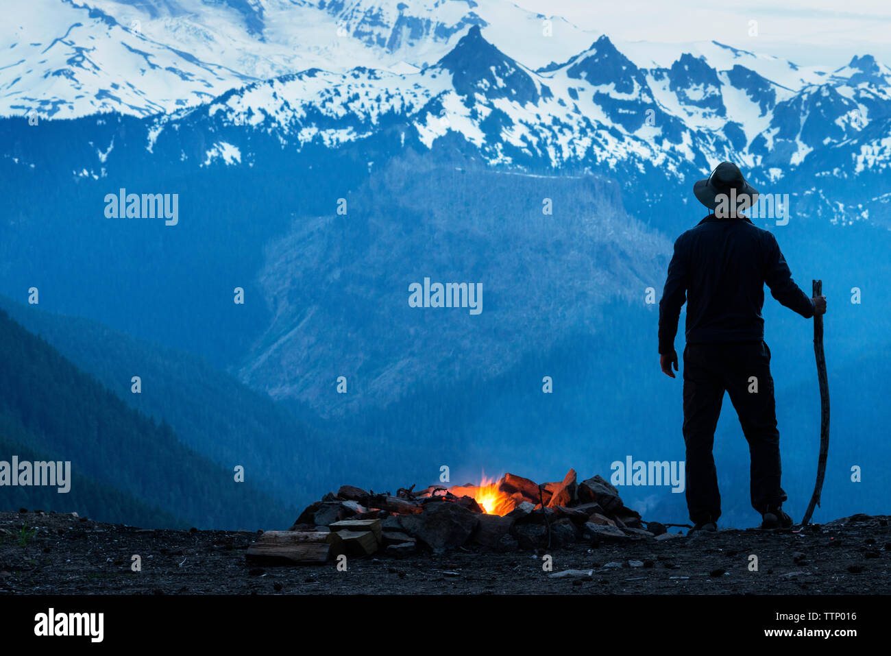 Man holding stick hi-res stock photography and images - Alamy