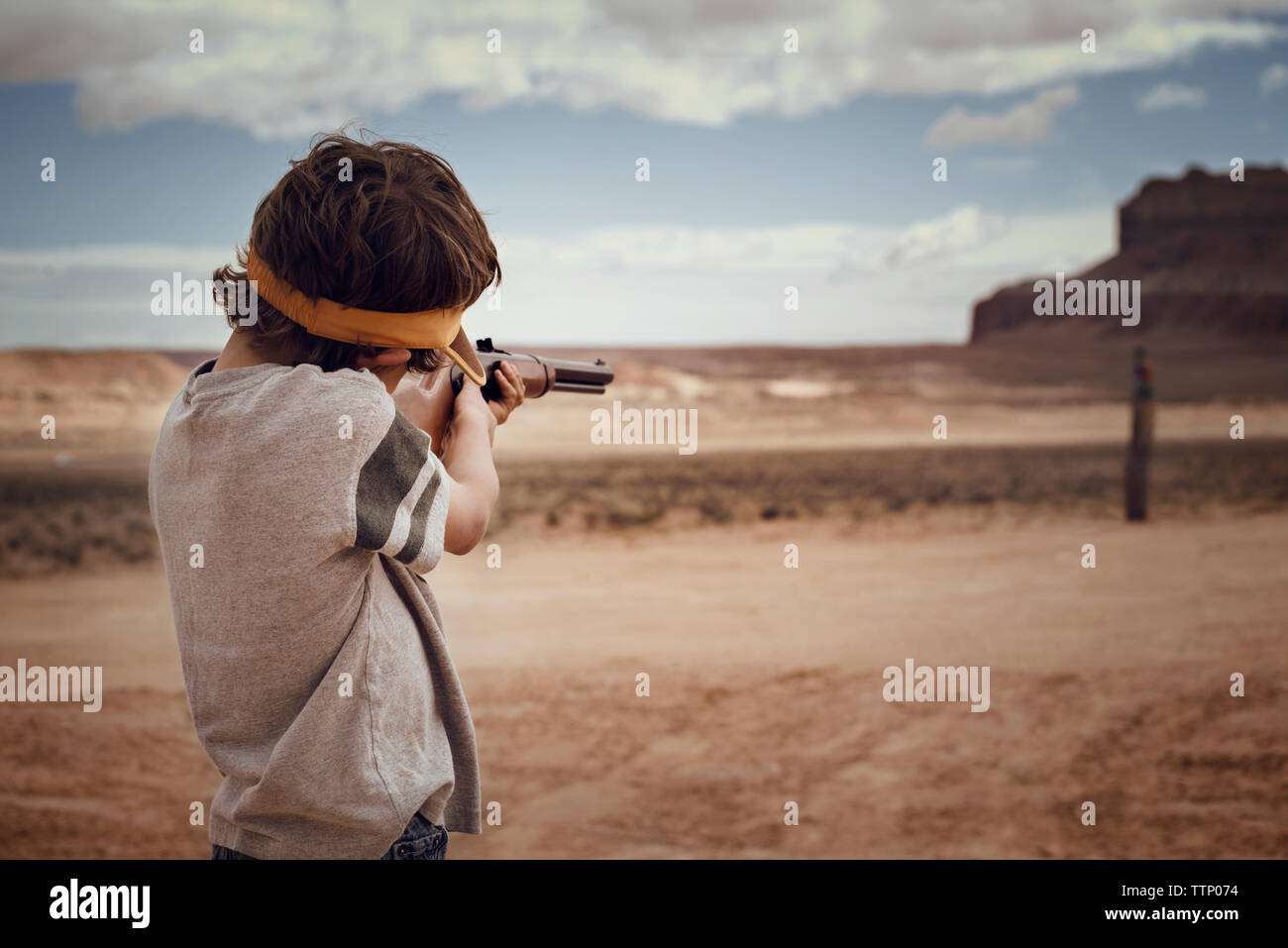 Boy with rifle hi-res stock photography and images - Alamy