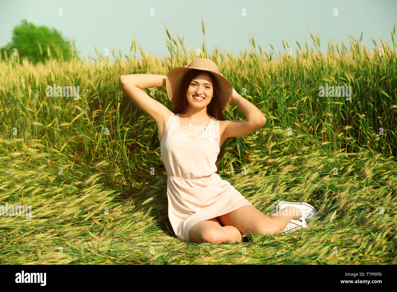 Beautiful girl in field Stock Photo - Alamy