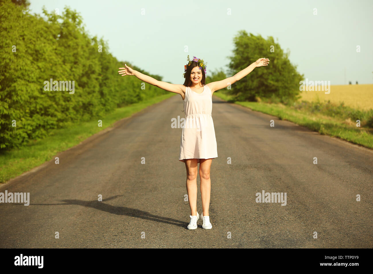 Beautiful girl on road Stock Photo - Alamy