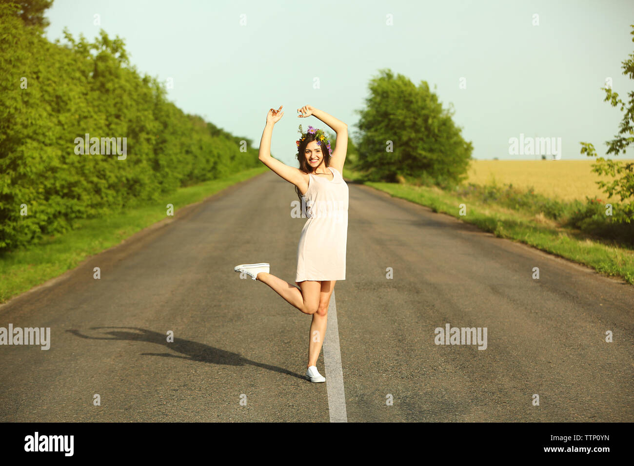 Beautiful girl on road Stock Photo - Alamy