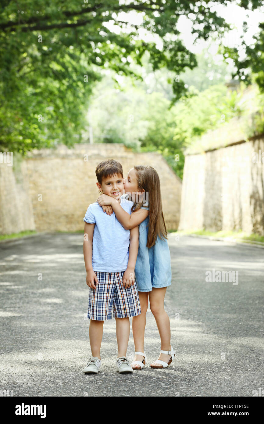 Small friendly kids on street Stock Photo - Alamy