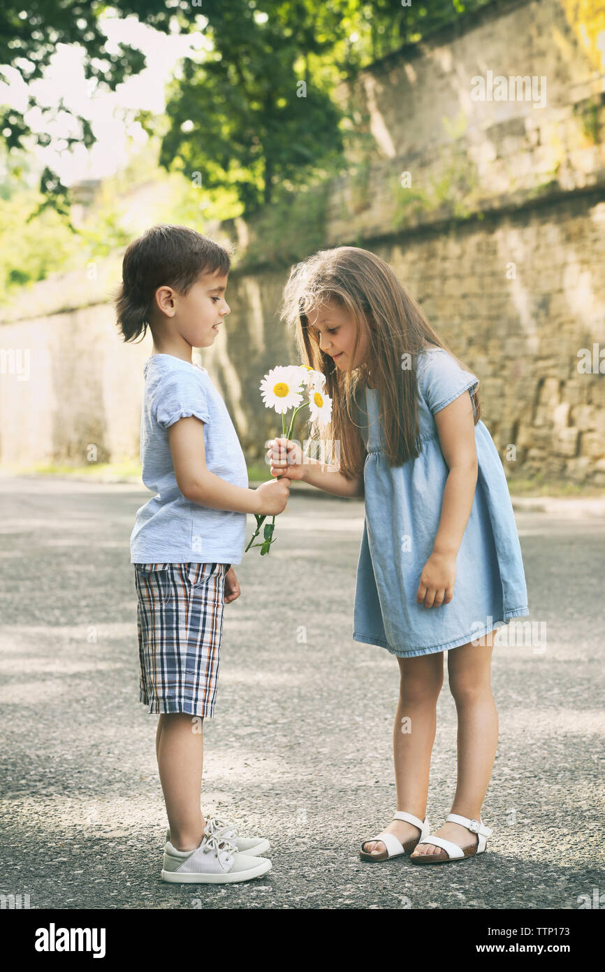 Small friendly kids on street Stock Photo - Alamy