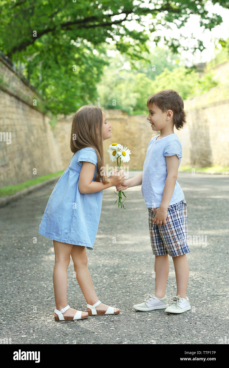 Small friendly kids on street Stock Photo - Alamy