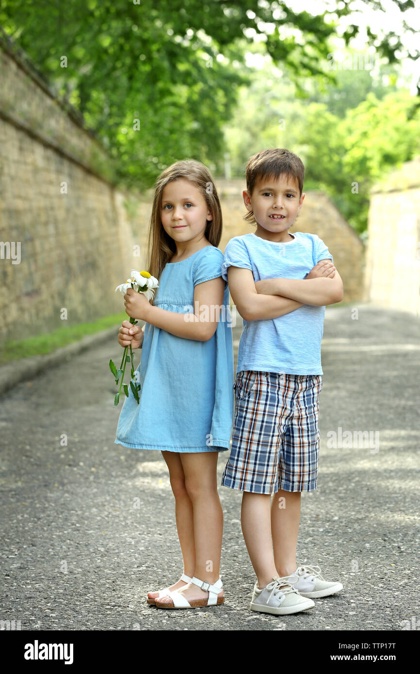 Small friendly kids on street Stock Photo - Alamy
