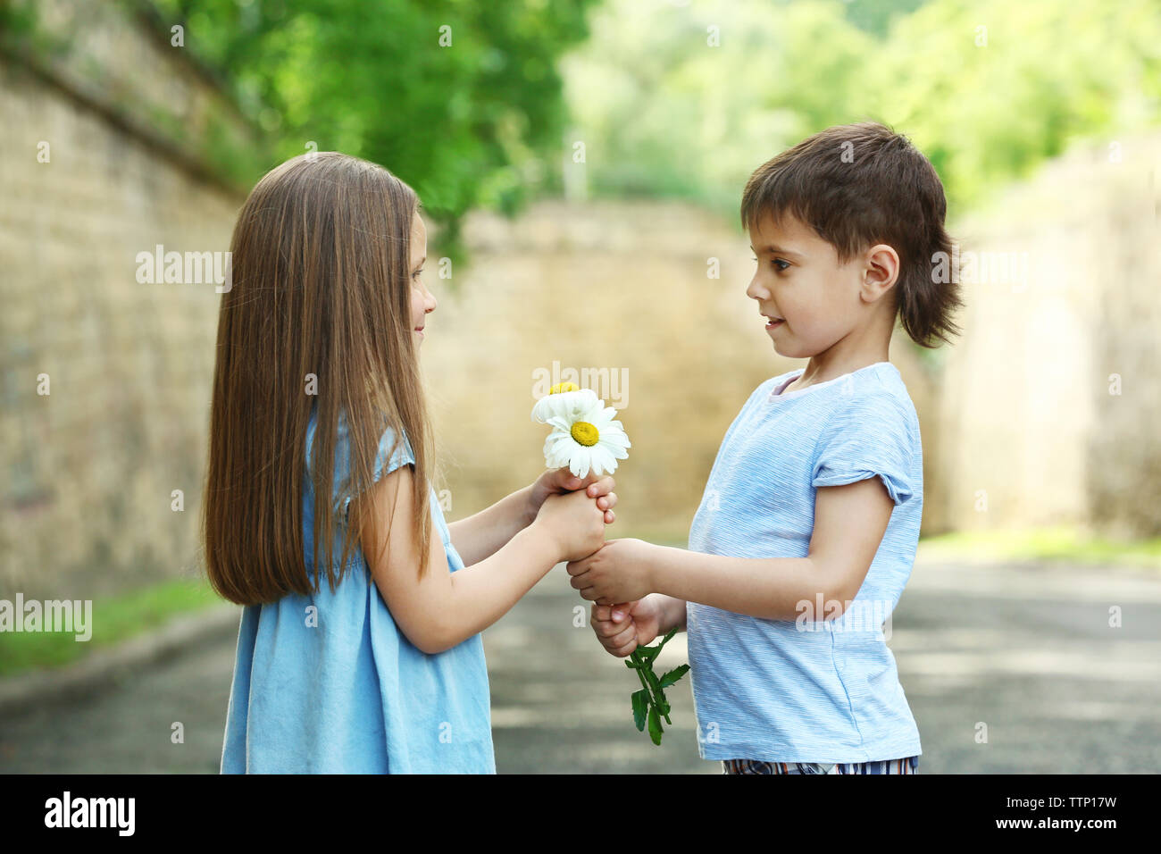 Small friendly kids on street Stock Photo - Alamy