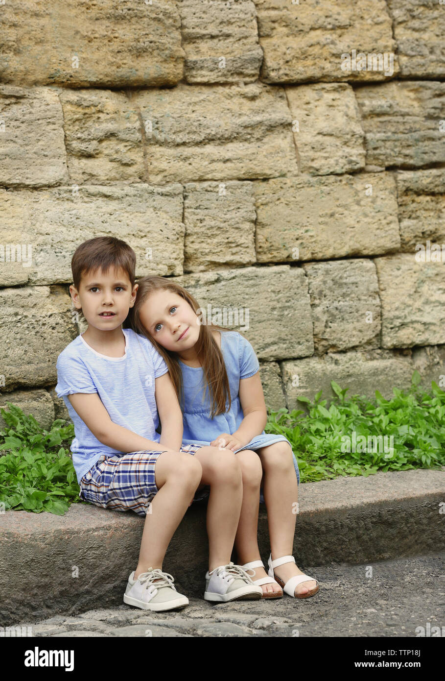 Small friendly kids on street Stock Photo - Alamy