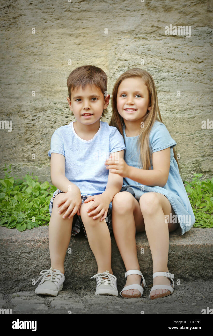 Small friendly kids on street Stock Photo - Alamy