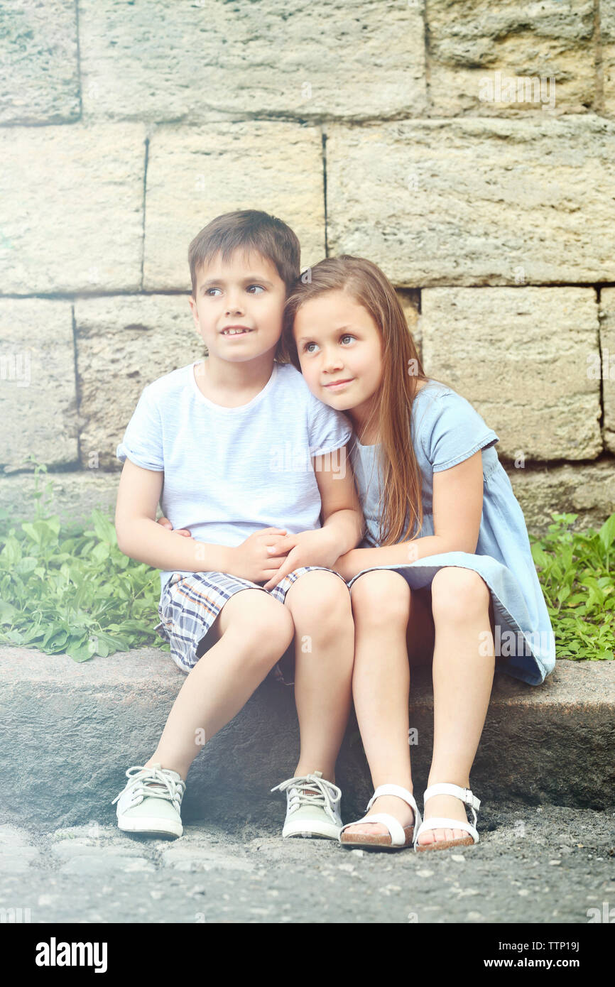 Small friendly kids on street Stock Photo - Alamy
