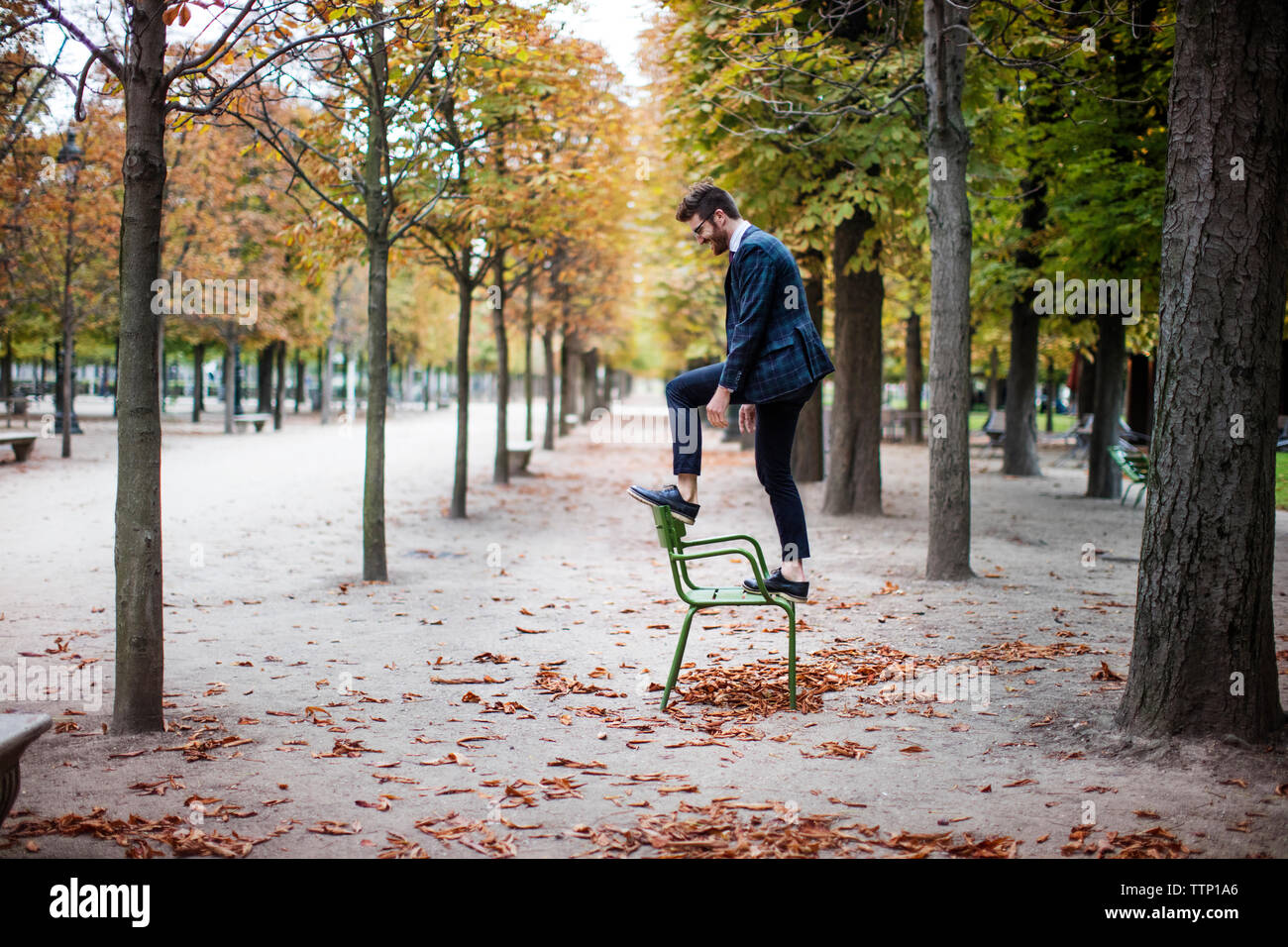 Balance on chair hi-res stock photography and images - Alamy