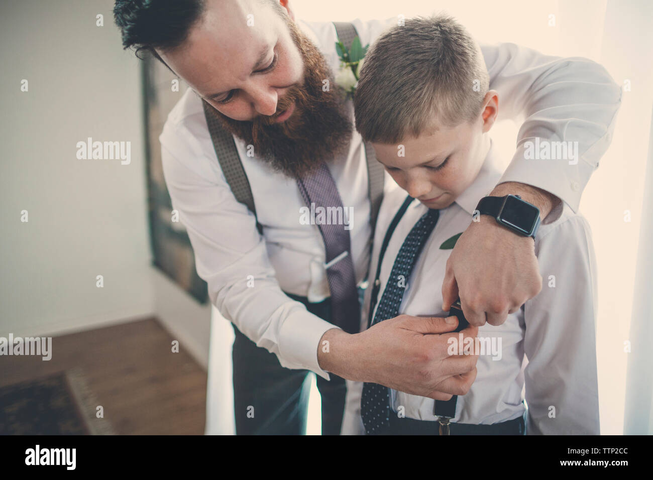 Boy getting dressed hi-res stock photography and images - Alamy