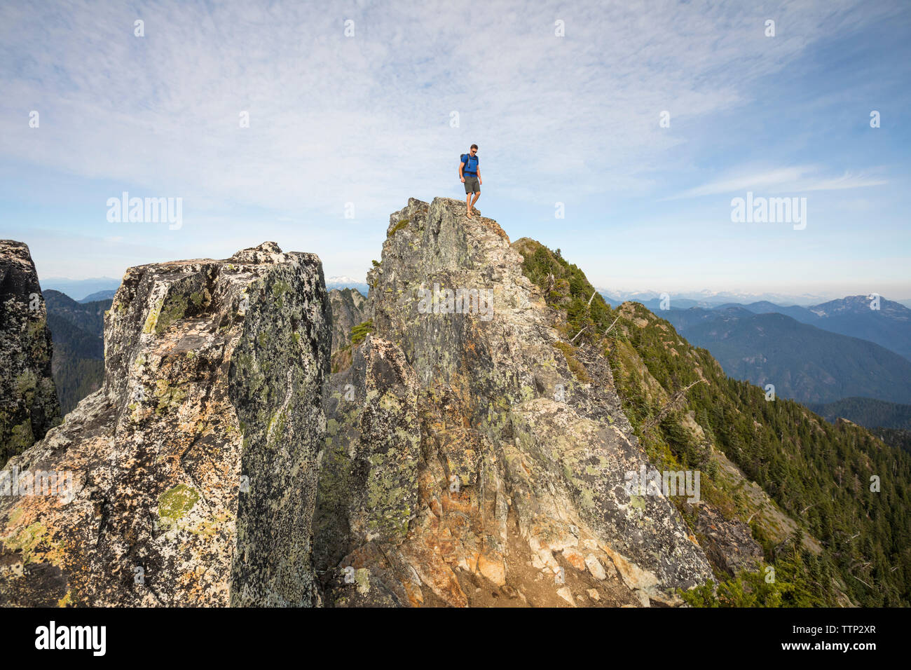 On cliff face with mountains hi-res stock photography and images - Alamy