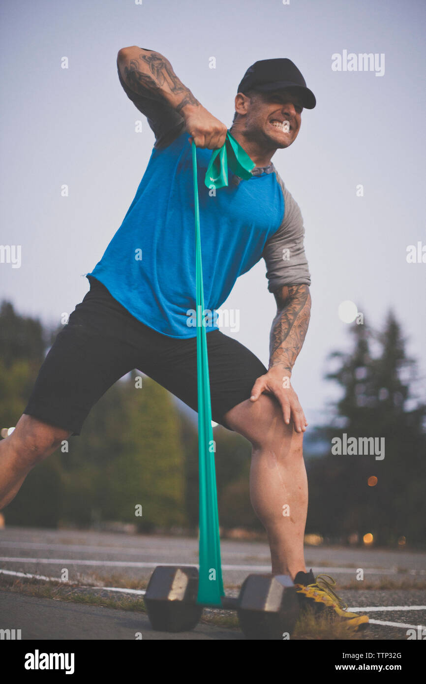 Man lifting dumbbell hi-res stock photography and images - Alamy