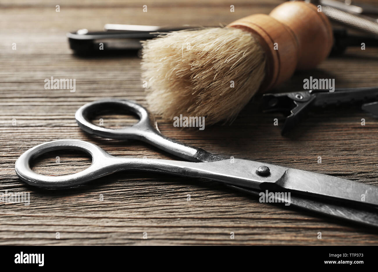 Vintage tools of barber shop on wooden background Stock Photo - Alamy