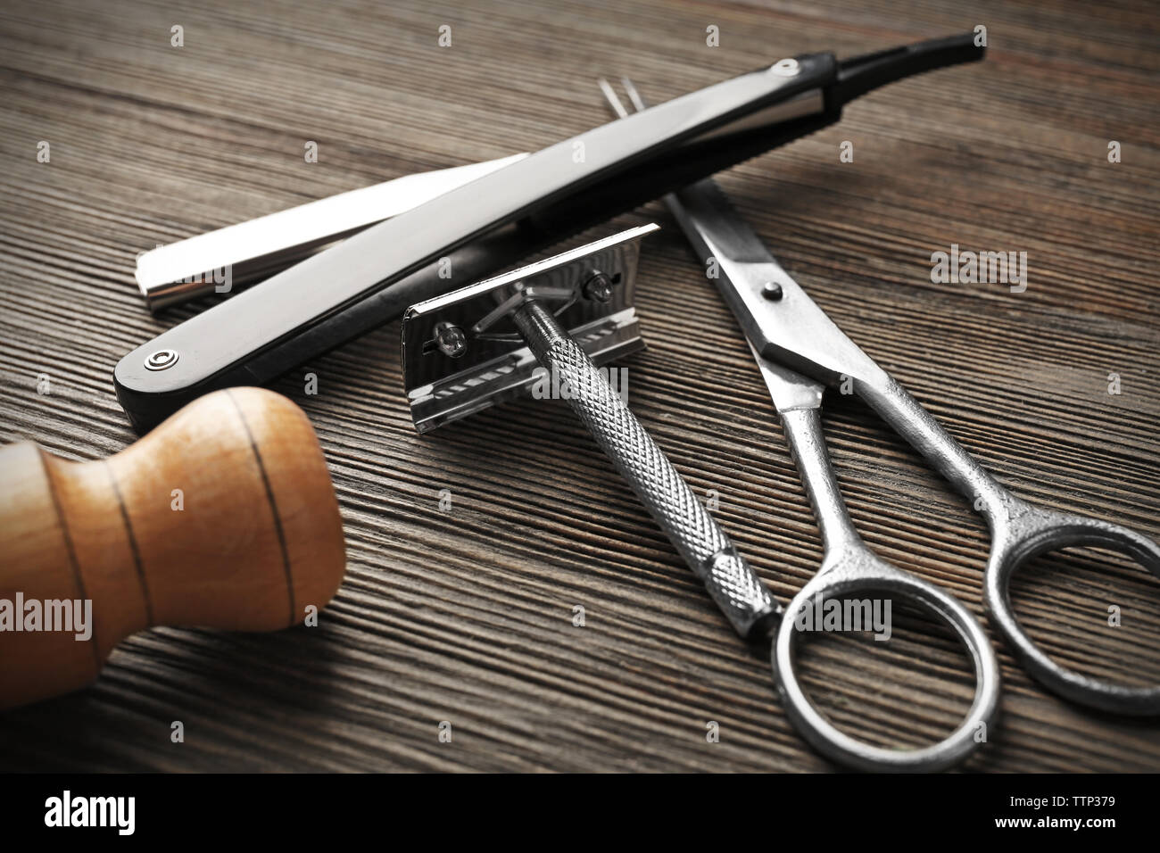 Vintage tools of barber shop on wooden background Stock Photo - Alamy