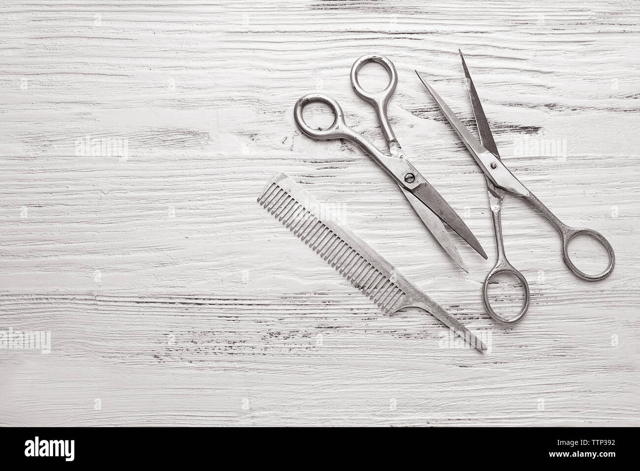 Vintage tools of barber shop on light wooden background Stock Photo - Alamy