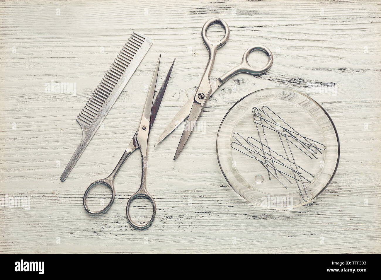 Vintage tools of barber shop on light wooden background Stock Photo - Alamy