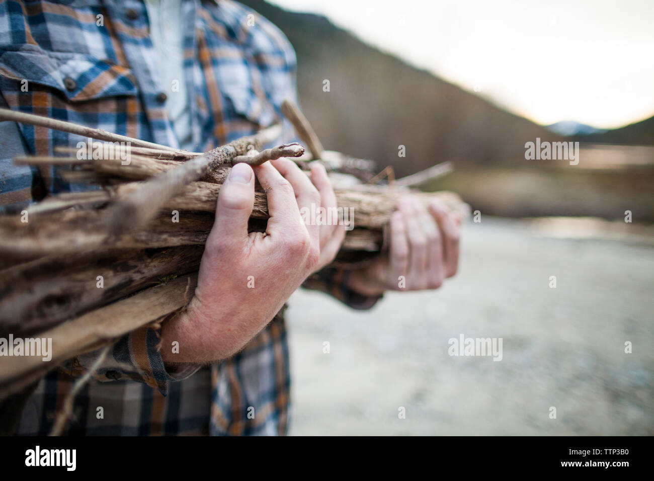 Man Carrying Firewood High Resolution Stock Photography and Images - Alamy