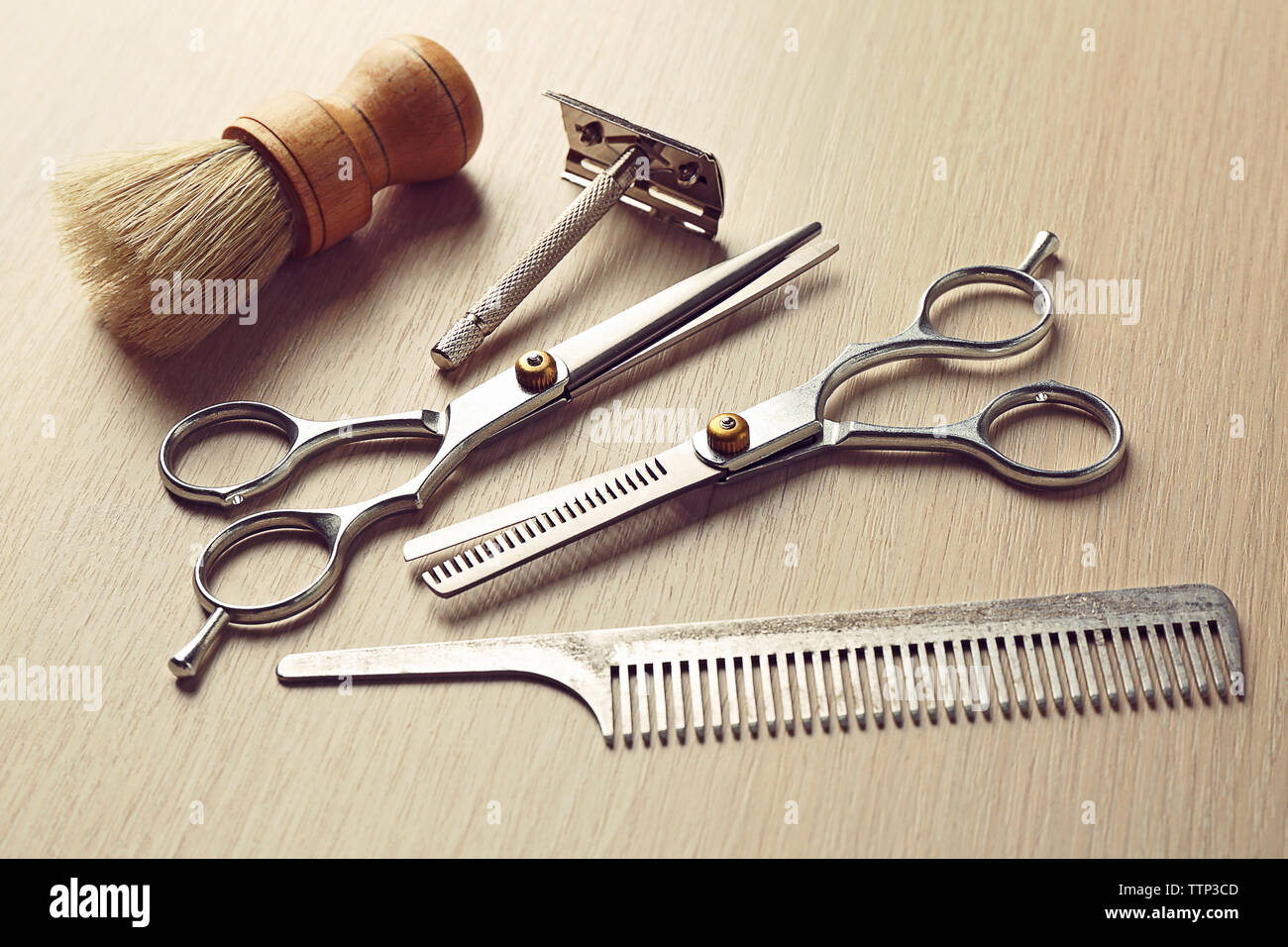 Vintage tools of barber shop on wooden background Stock Photo - Alamy