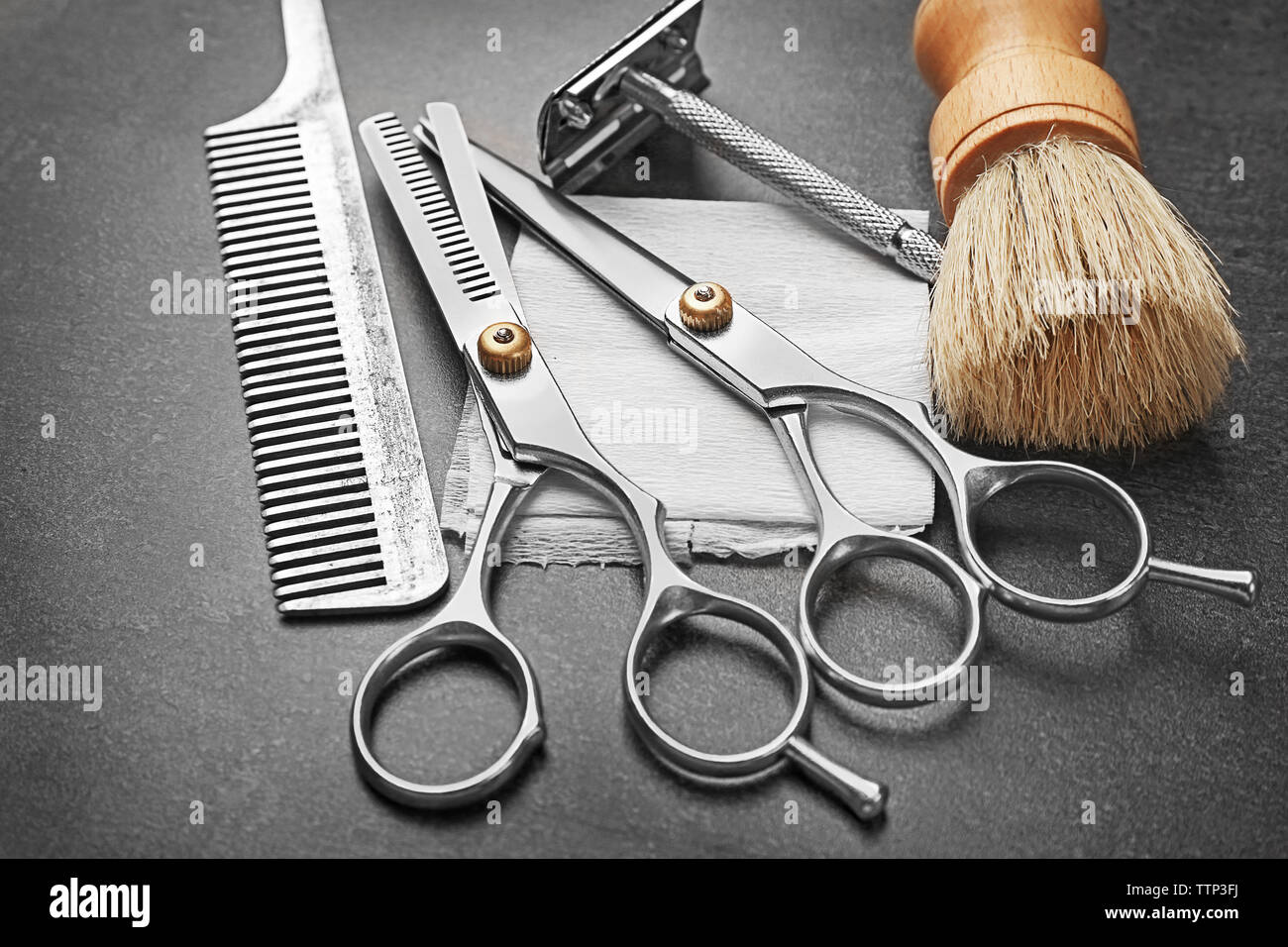 Vintage tools of barber shop on grey background Stock Photo - Alamy