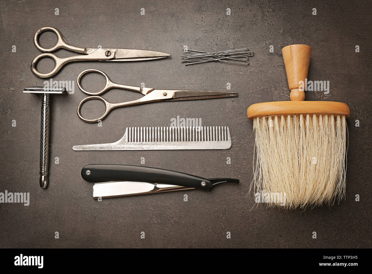 Vintage tools of barber shop on grey background Stock Photo - Alamy