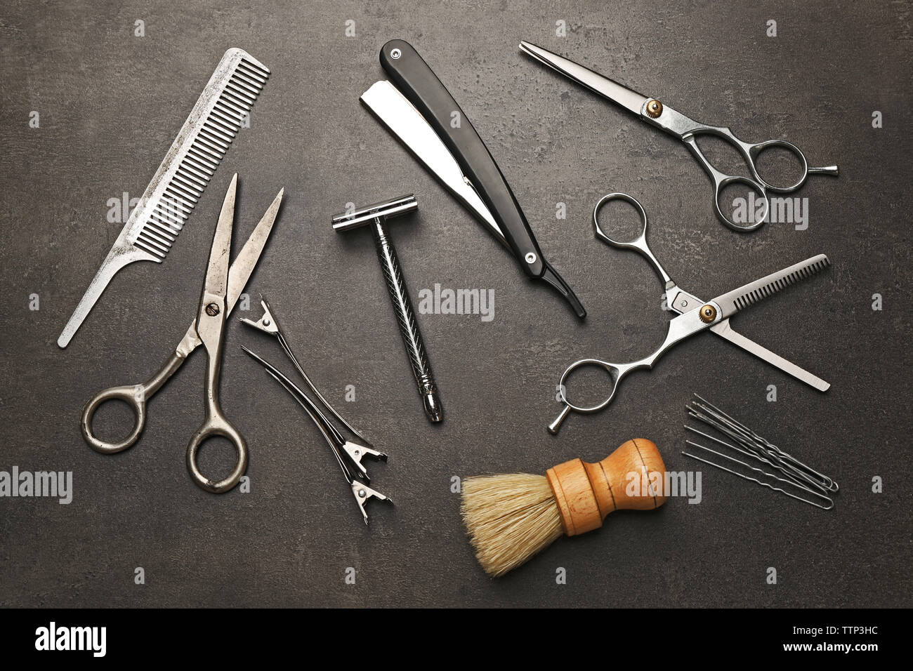 Vintage tools of barber shop on grey background Stock Photo - Alamy