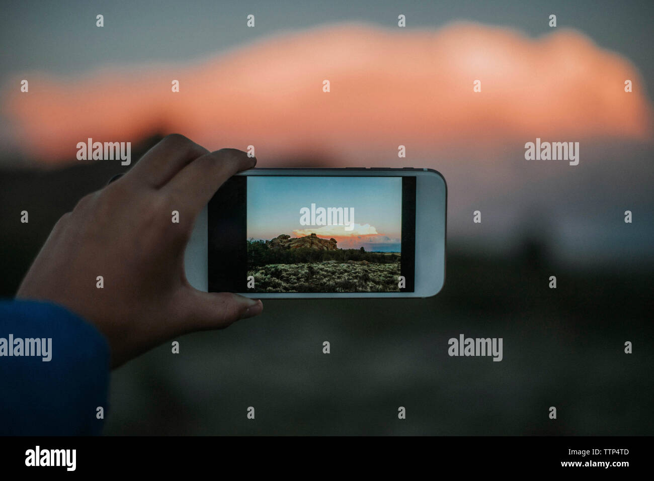 Hand holding phone landscape hi-res stock photography and images - Alamy