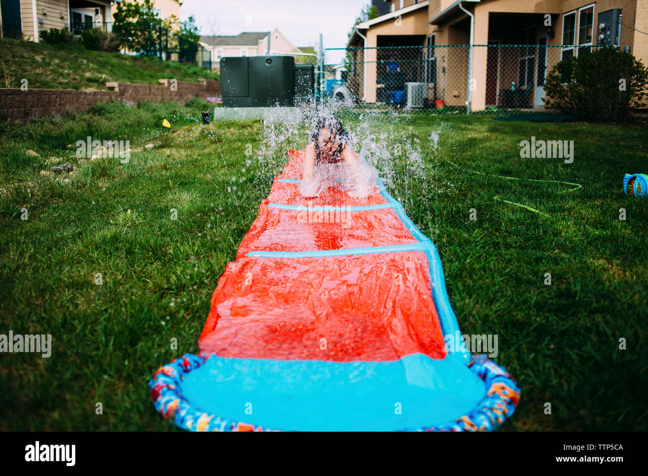 Girl water slide hi-res stock photography and images - Alamy