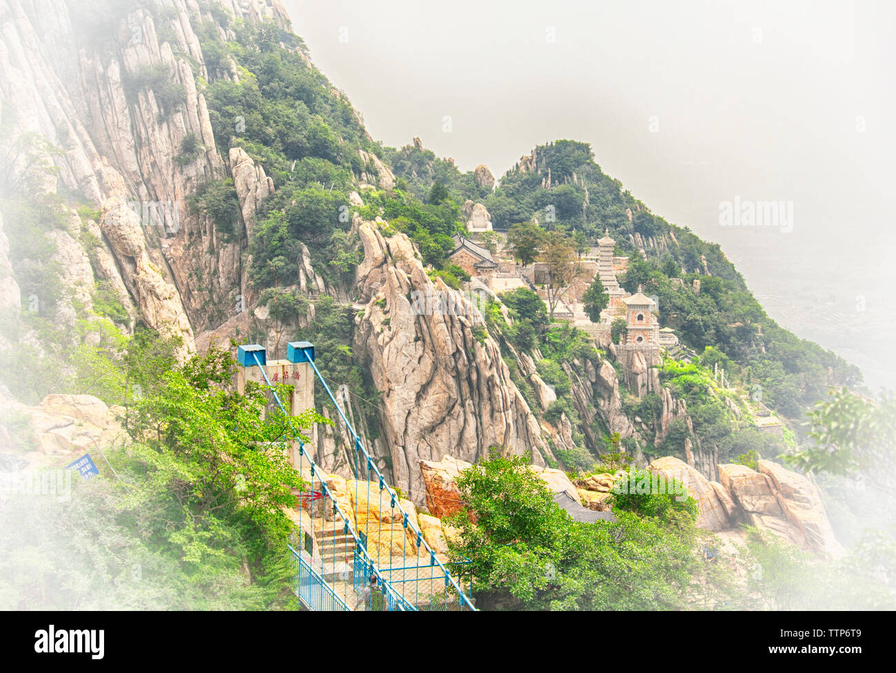 The sky high suspension bridge on the sanhuangzhai plank walk way with ...