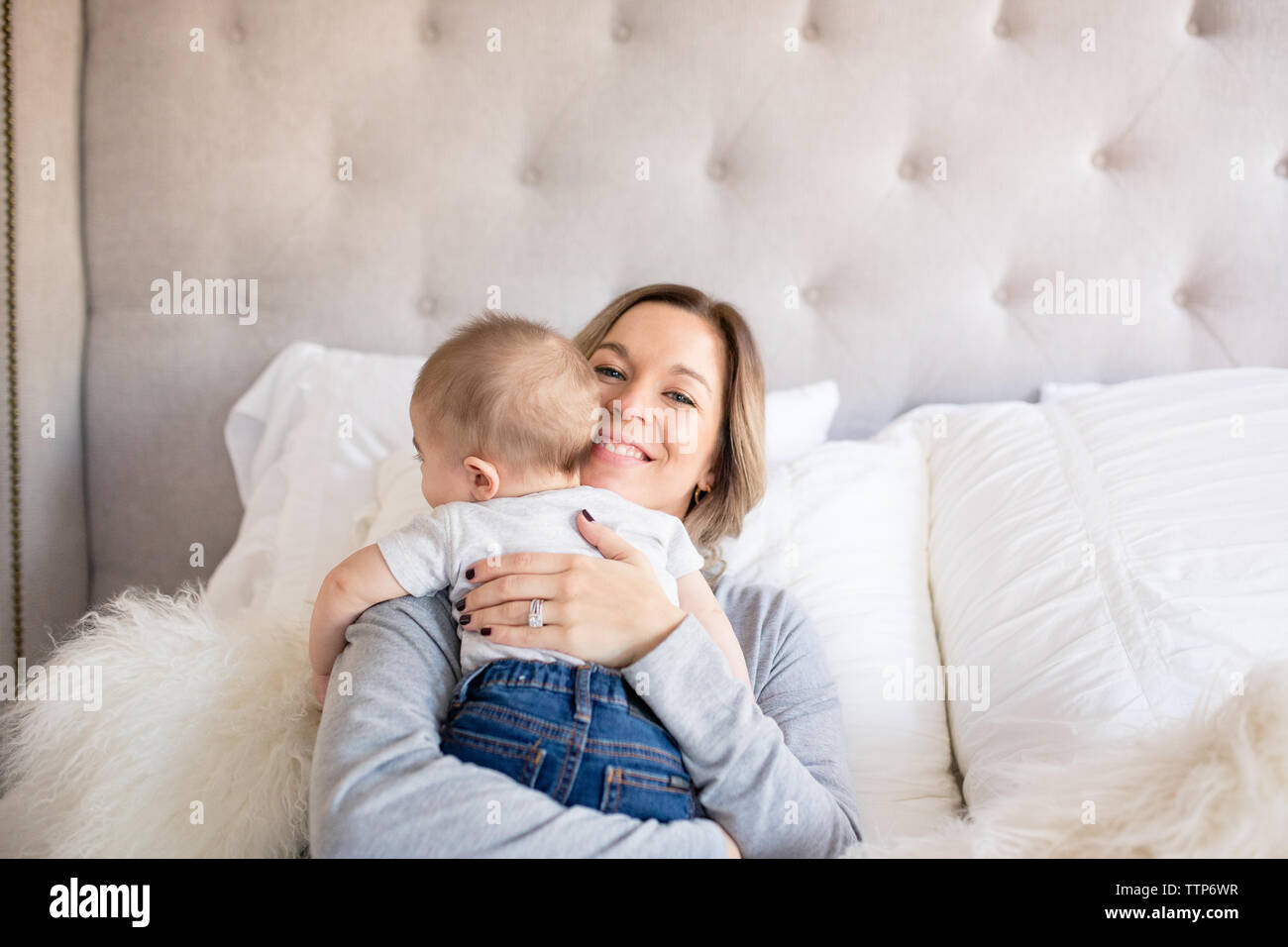 Hug hugging jeans denim hi-res stock photography and images - Alamy