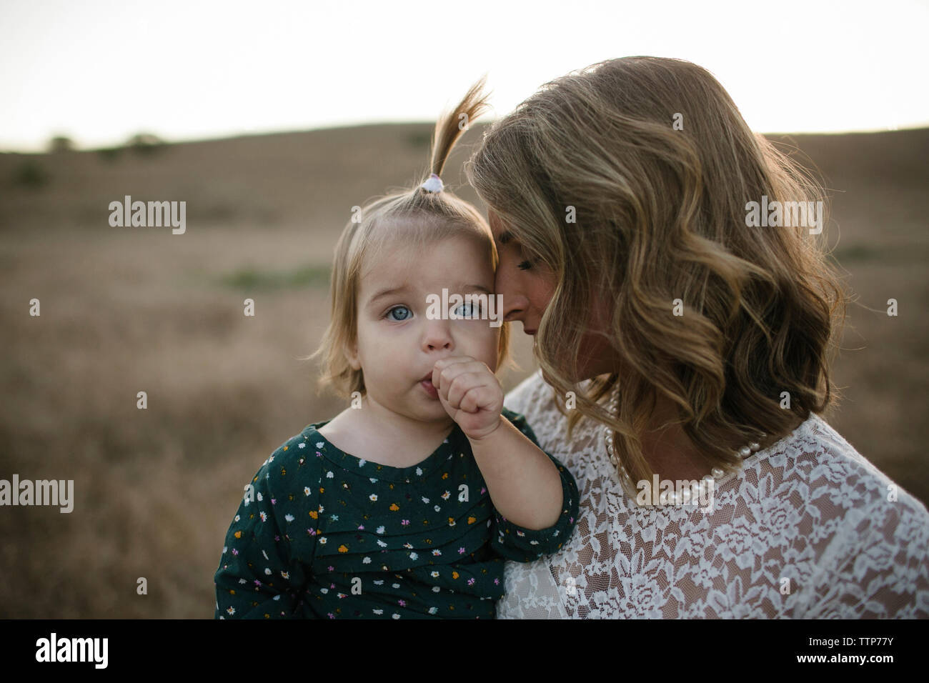 Daughter standing hi-res stock photography and images - Alamy