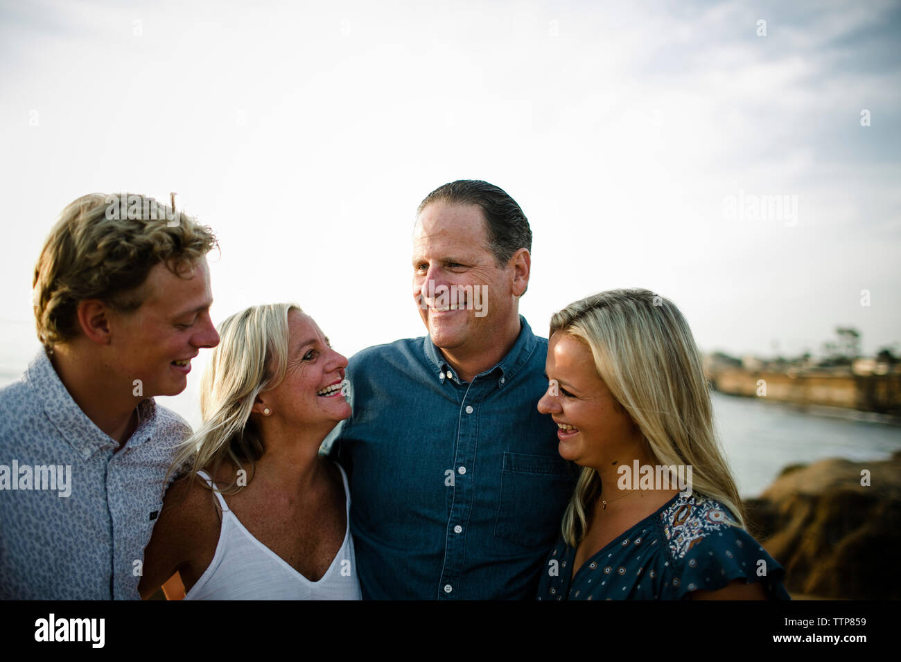 Father and daughter standing at beach hi-res stock photography and ...