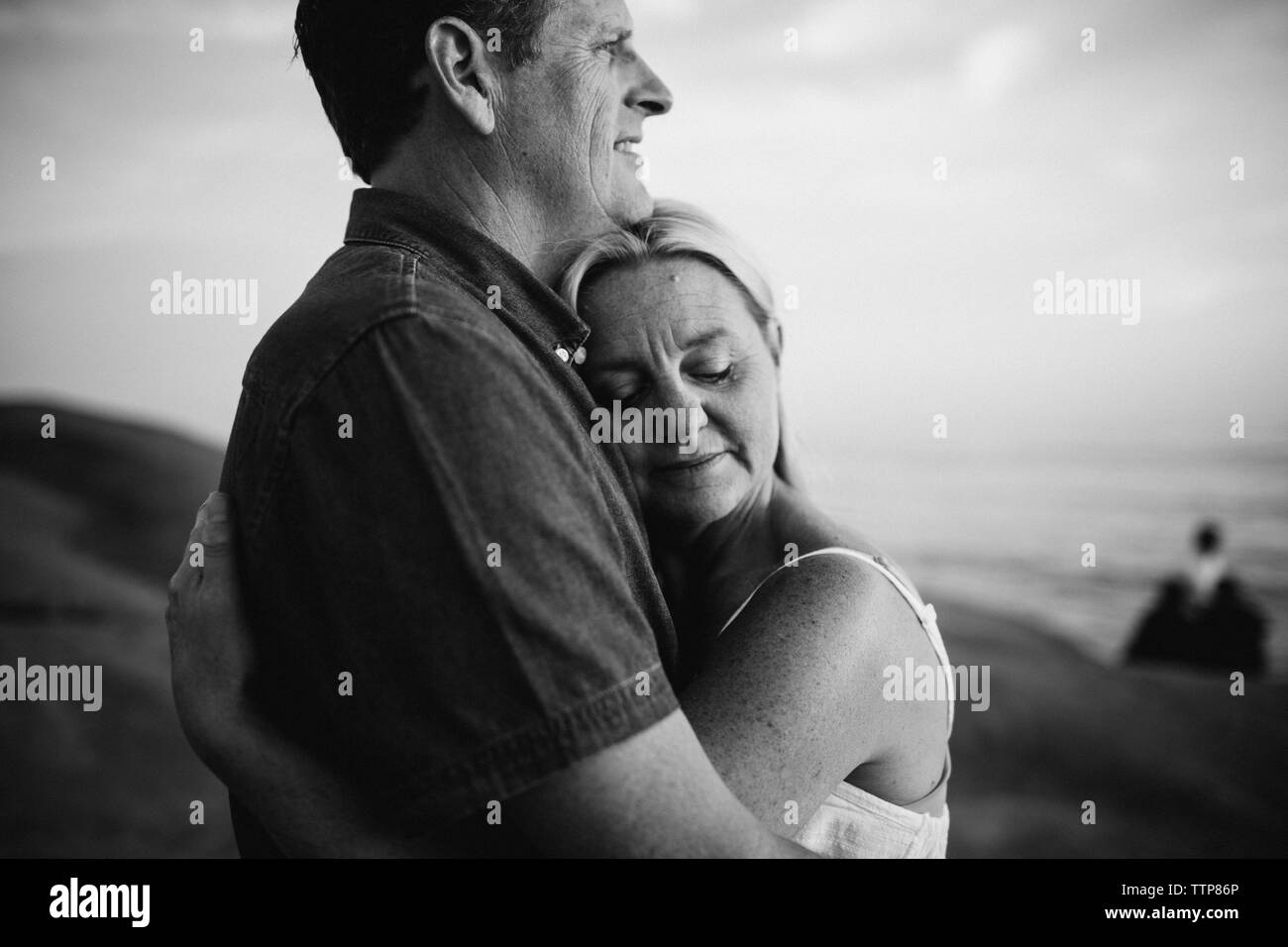 Man standing cliff activity Black and White Stock Photos & Images - Alamy