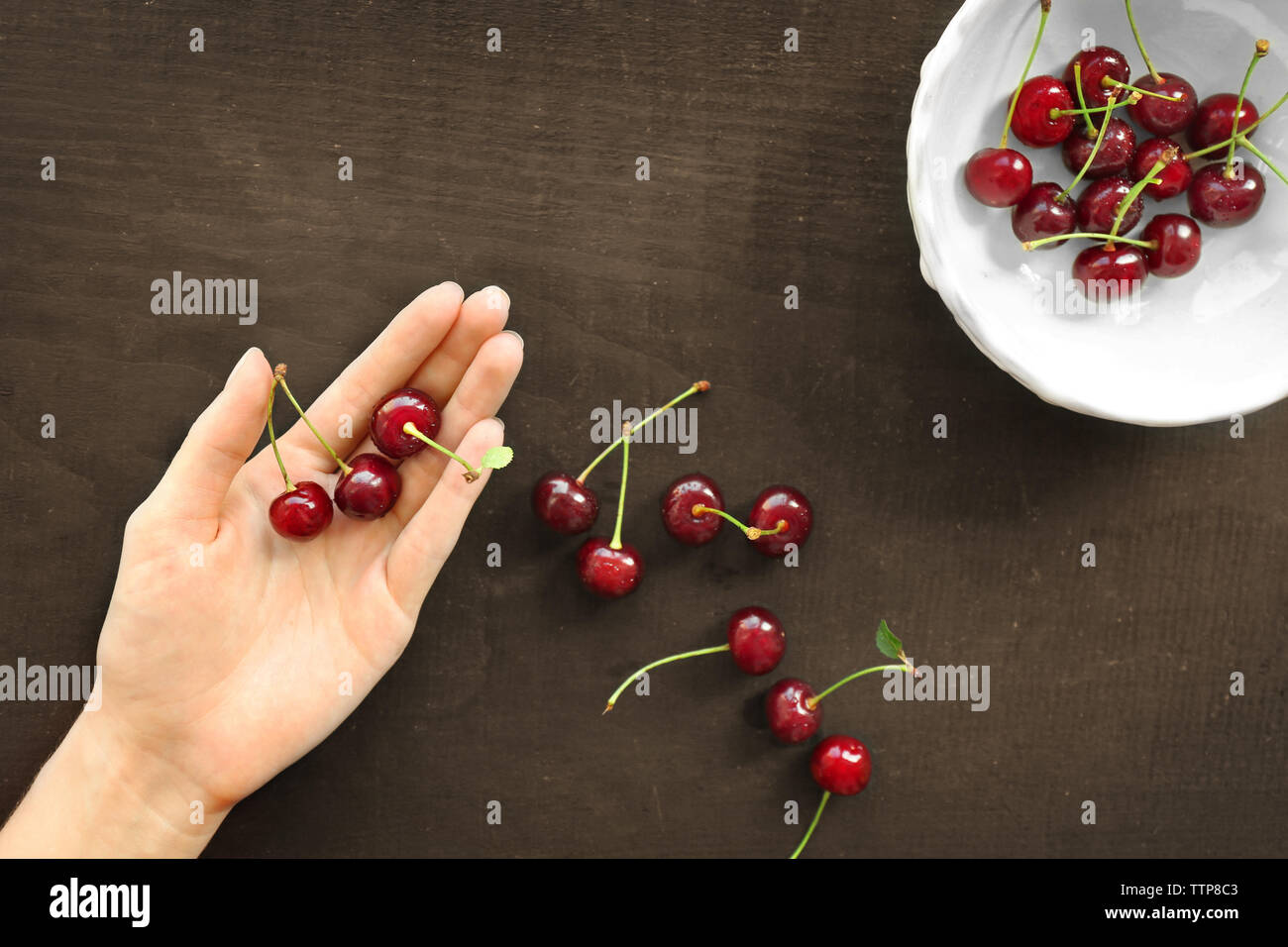 Hand Holding Cherries High Resolution Stock Photography and Images - Alamy