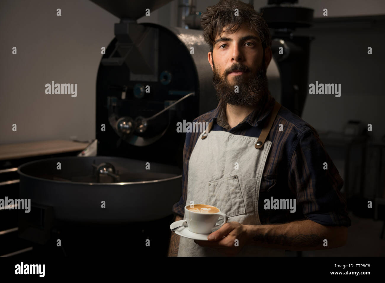 Portrait of man with coffee in cafe Stock Photo - Alamy