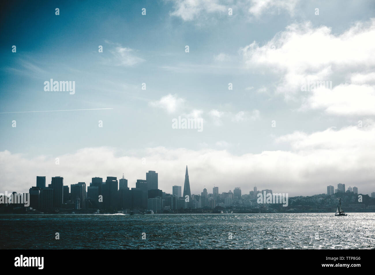 Downtown against cloudy skyline hi-res stock photography and images - Alamy