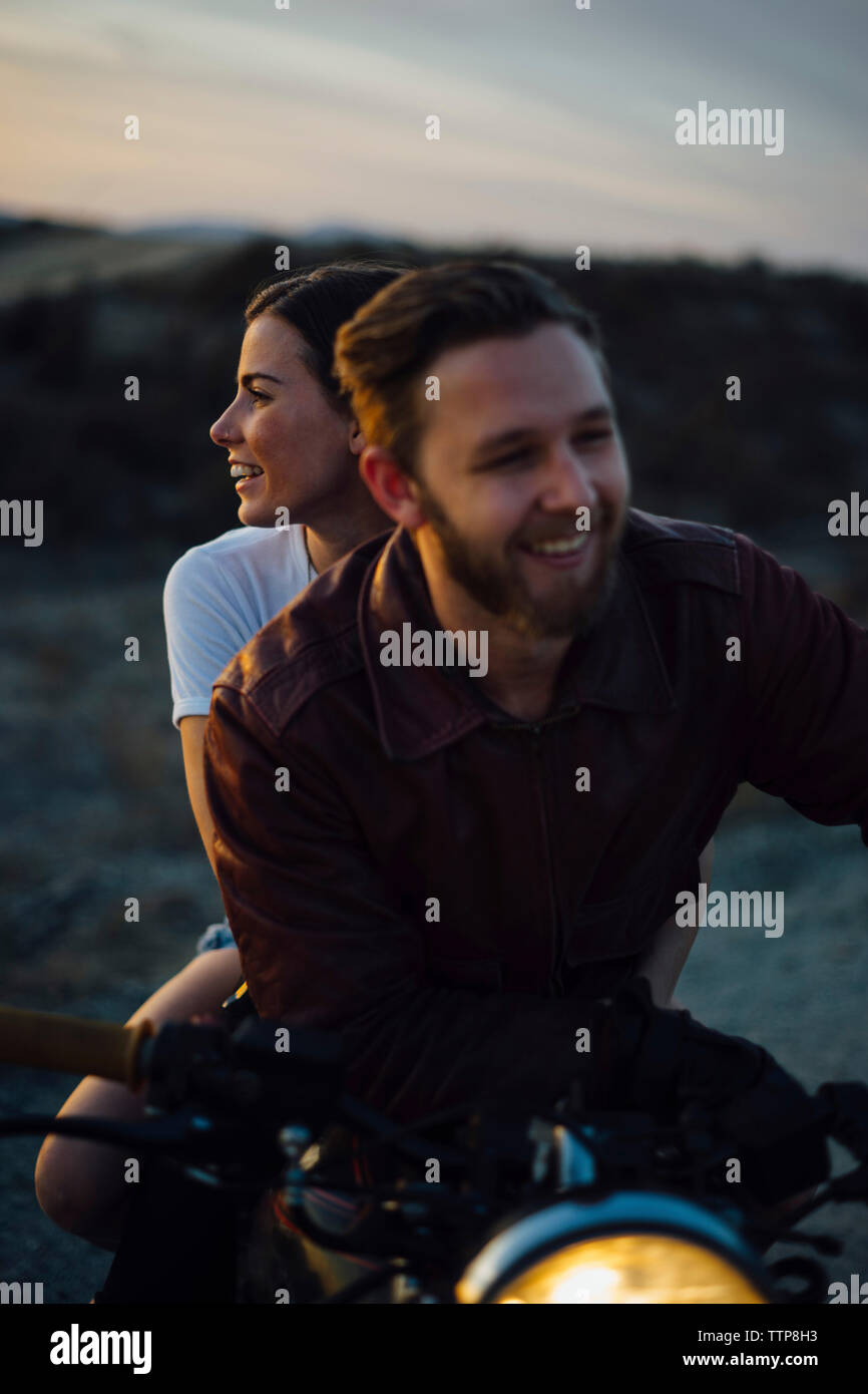 Couple sitting on motorcycle hi-res stock photography and images - Alamy
