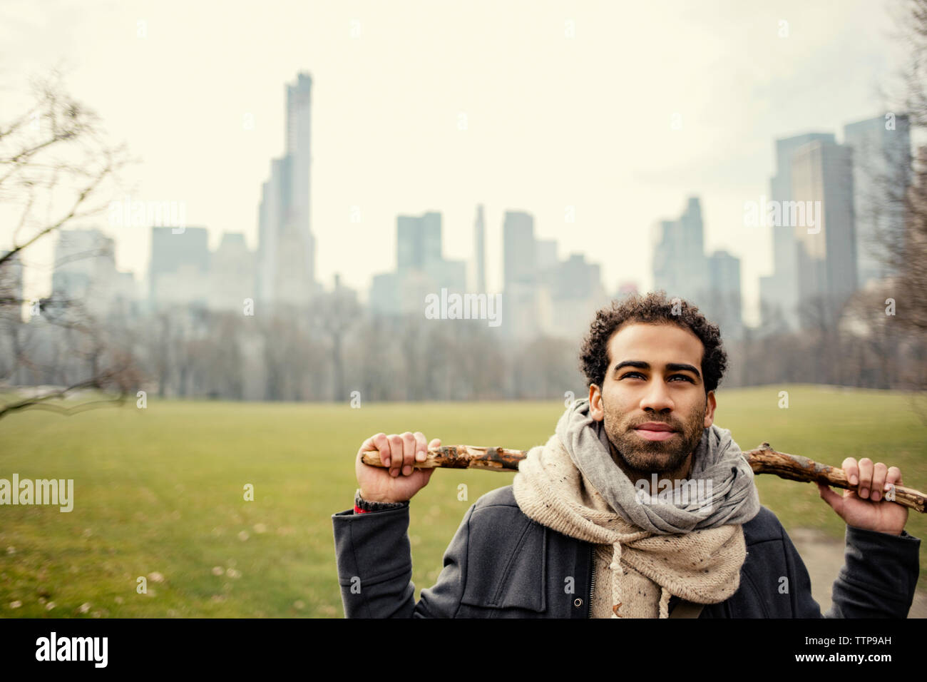 Man holding stick hi-res stock photography and images - Alamy